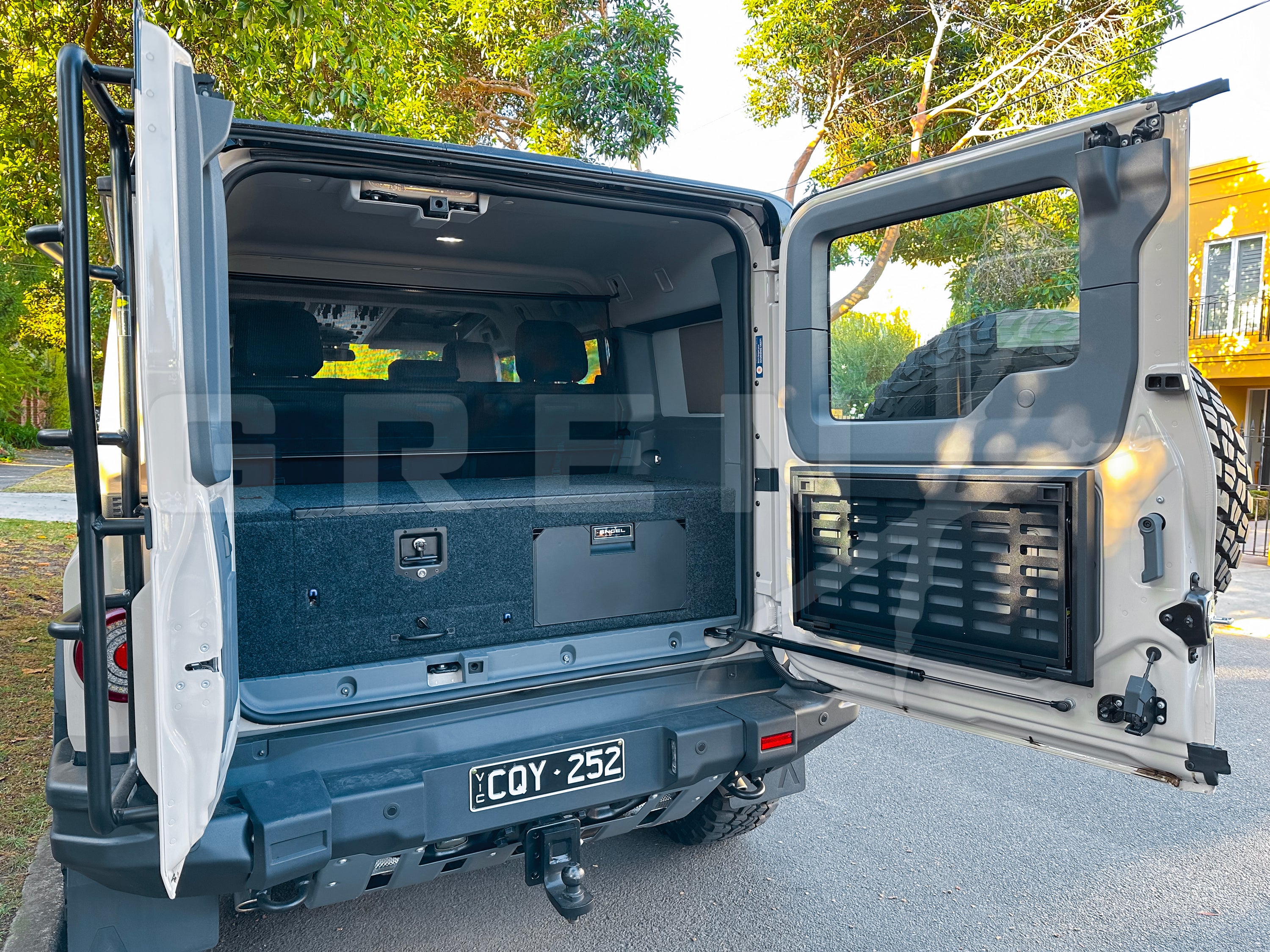 GrenX drawer system with integrated fridge & double bed platform Ineos