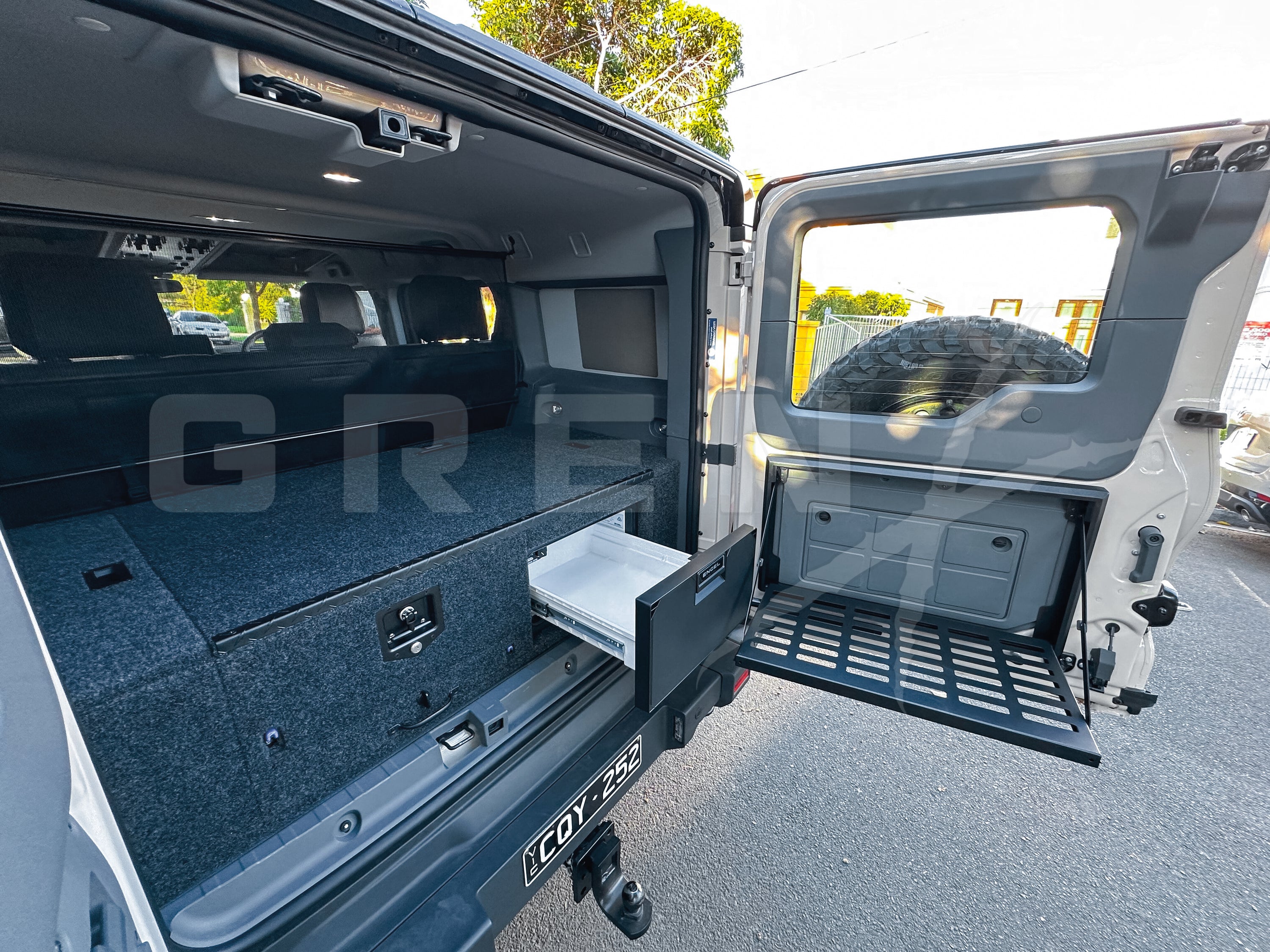 GrenX drawer system with integrated fridge & double bed platform Ineos